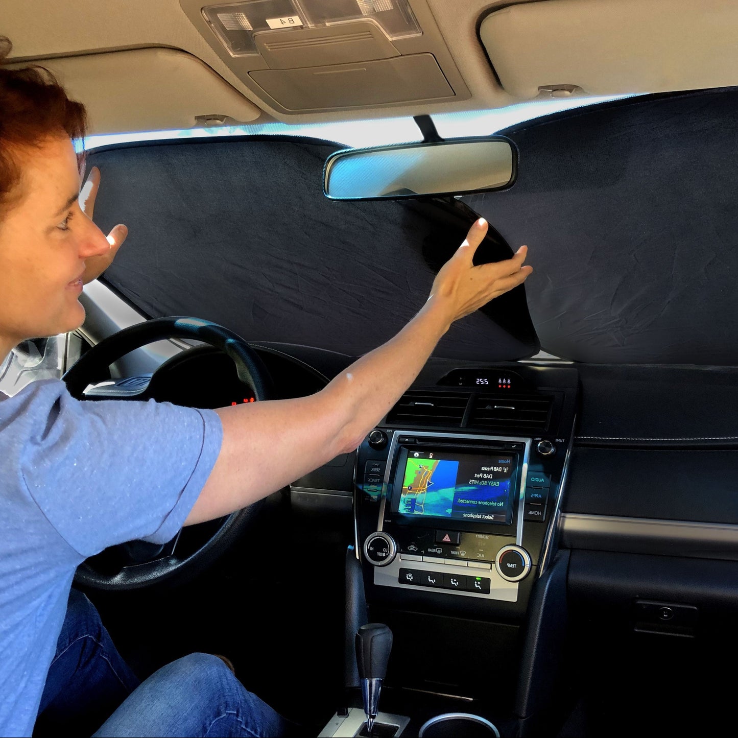 EzyShade Windshield Sun Shade with Shield-X Reflective Technology. See